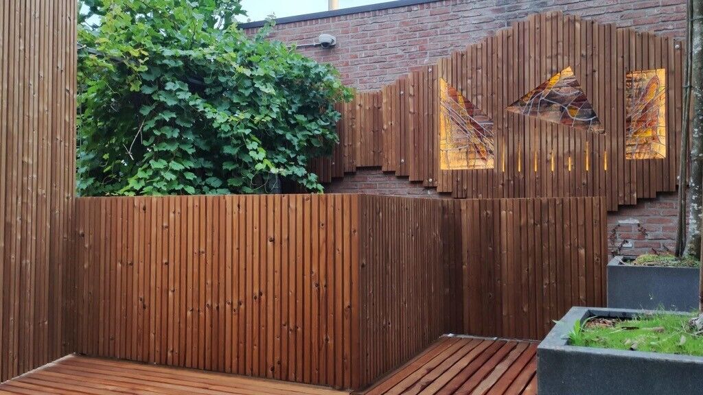 Charmant jardin de ville avec Thermowood® Triple et… | Van Steenberge